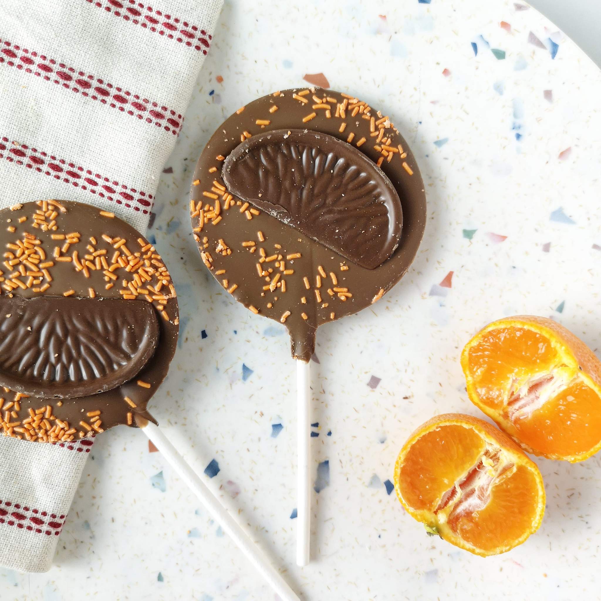 Milk Chocolate Orange Chocolate Lollipop – THE SLABB